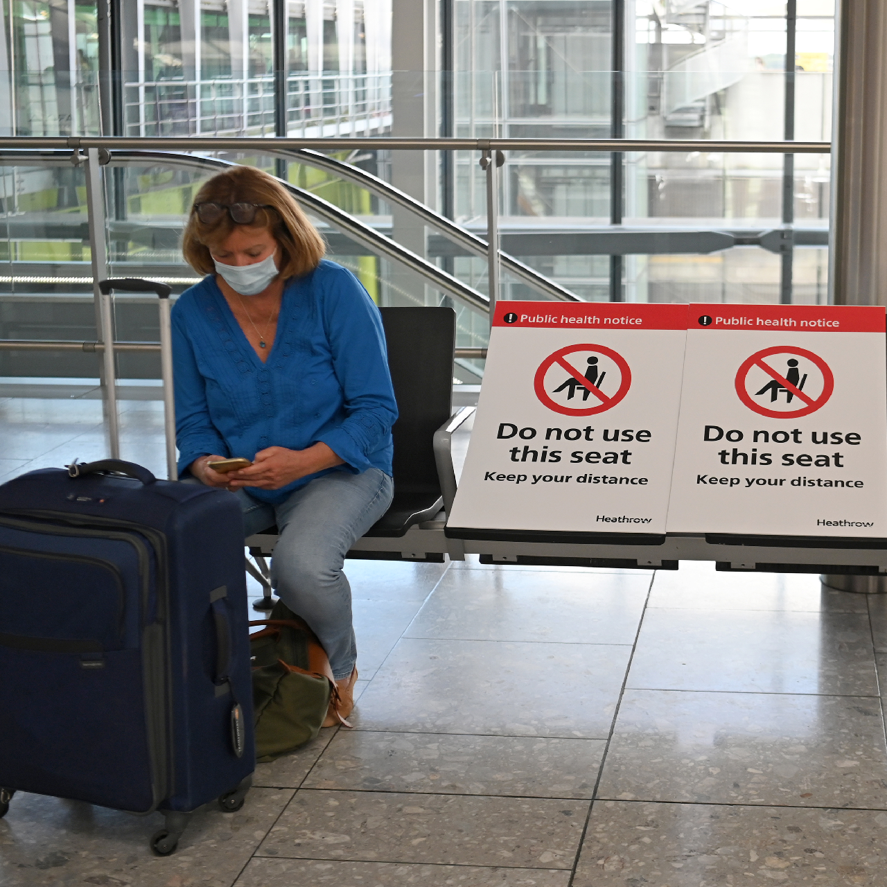 Passengers show mix of worry and delight as UK quarantine rules lifted ...