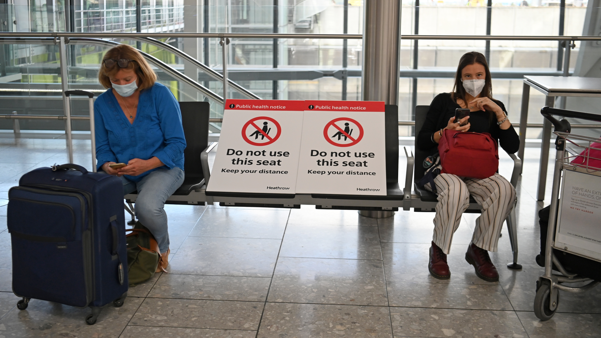Passengers show mix of worry and delight as UK quarantine rules lifted ...