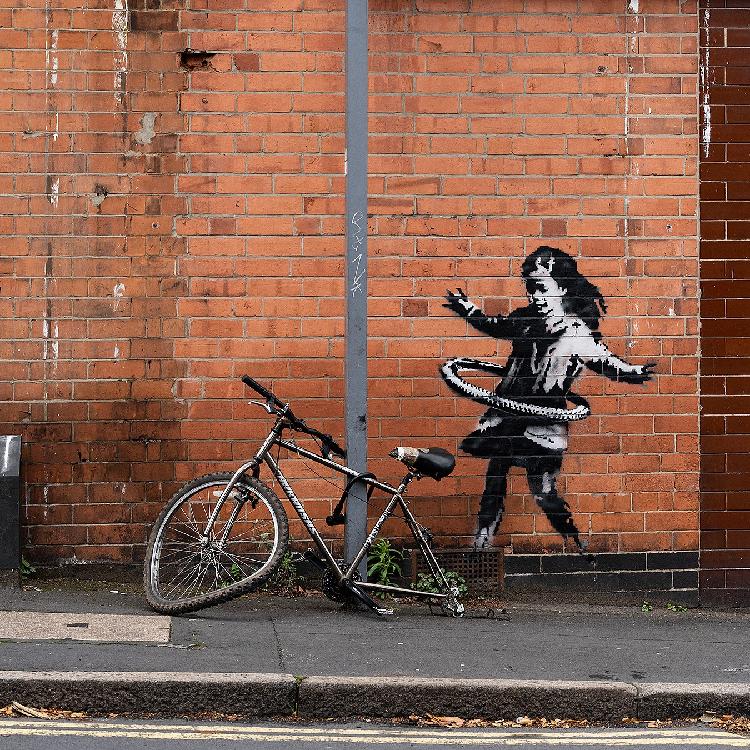 Street artist Banksy confirms new bicycle-tire artwork - CGTN