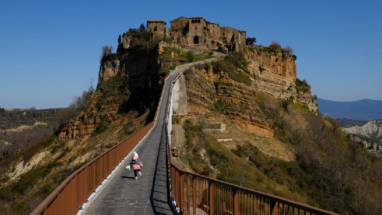 Italy's 'dying town' hopes for UNESCO funding in bid to stay alive - CGTN