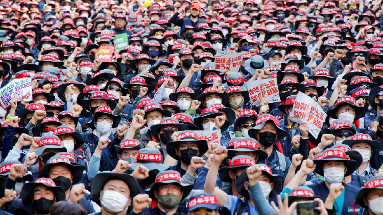 In pictures: Workers of the world unite for International Labor Day - CGTN