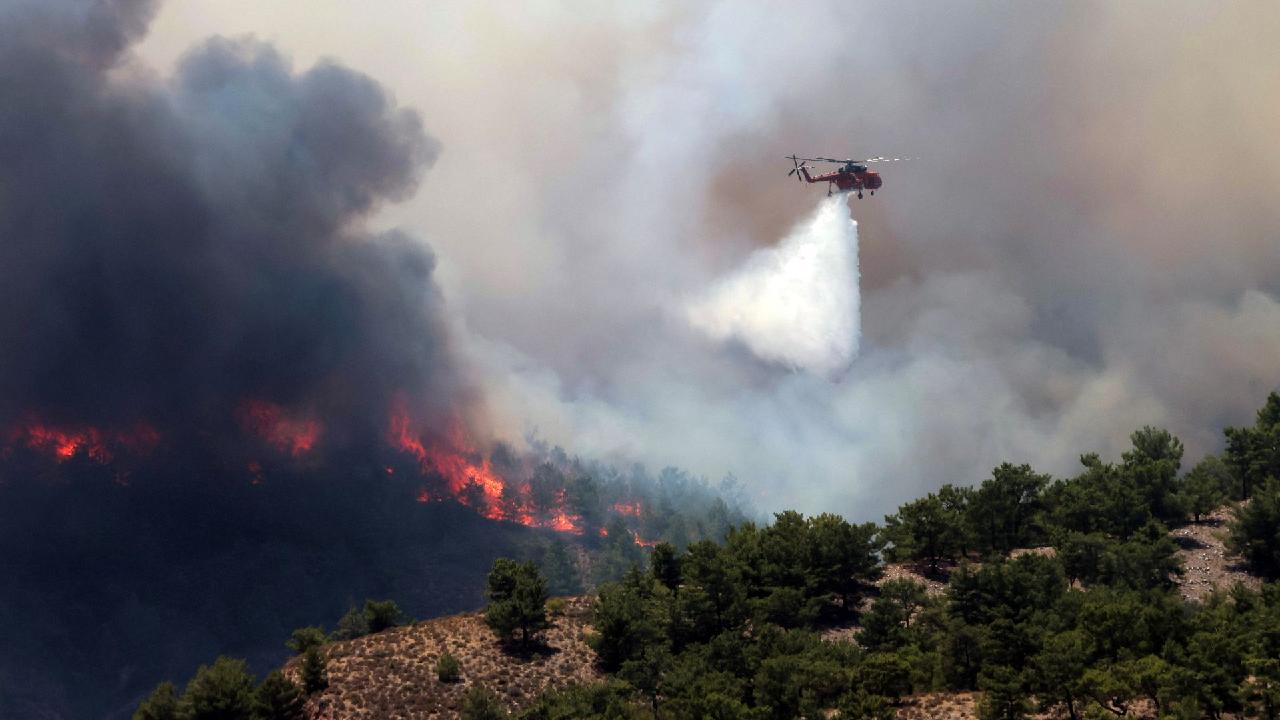Rescue flights begin as Greek island wildfires spread - CGTN