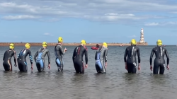 Dozens of swimmers fall ill after UK triathlon competition - CGTN